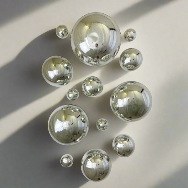 Silver set of 13 Wall Spheres.